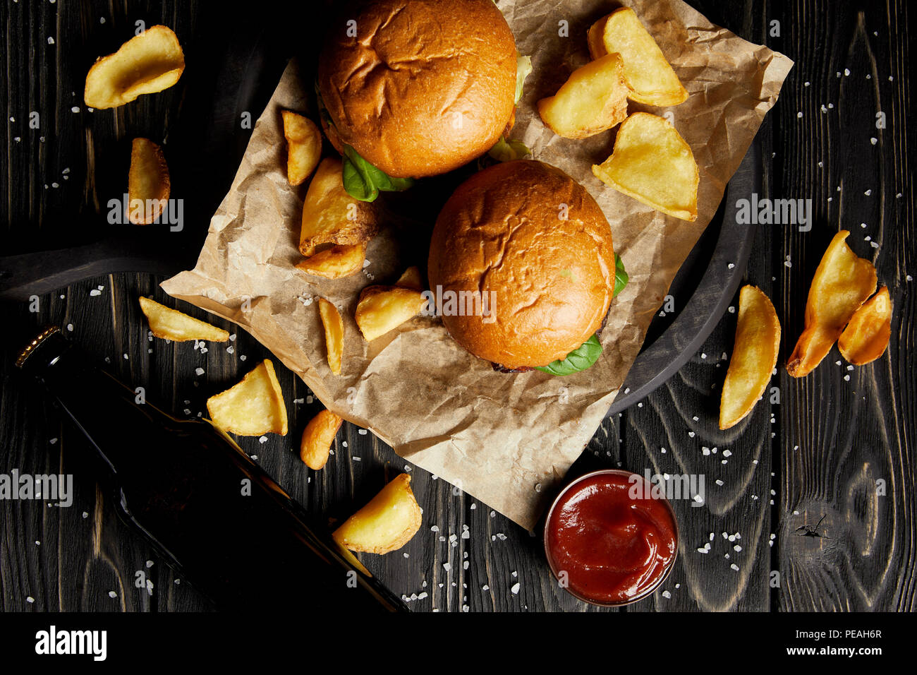 Set of junk food hamburgers and fried potatoes on craft paper Stock ...