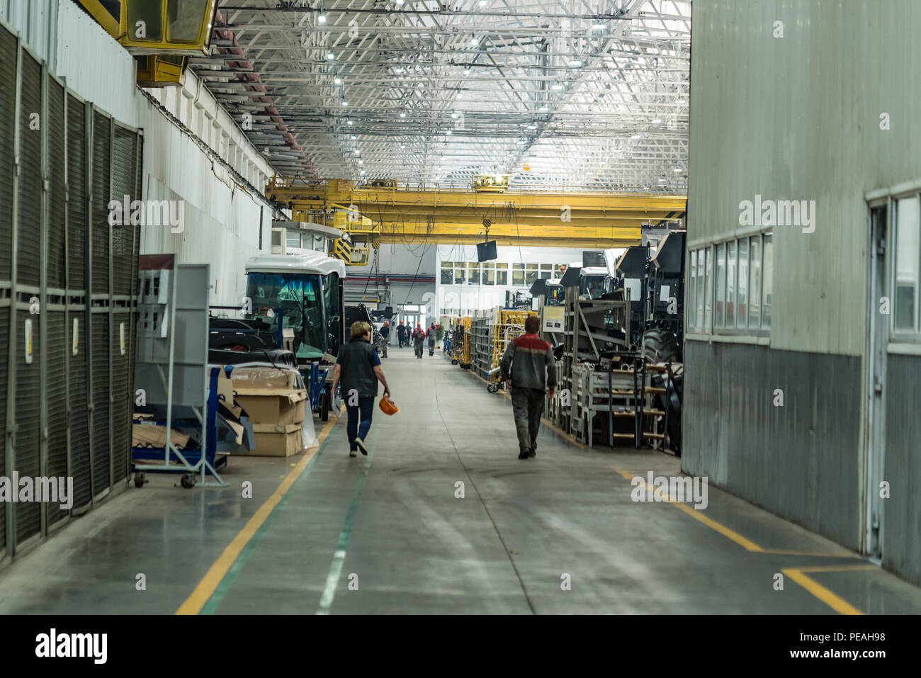 Workers at assembly workshop at industrial plant Stock Photo - Alamy