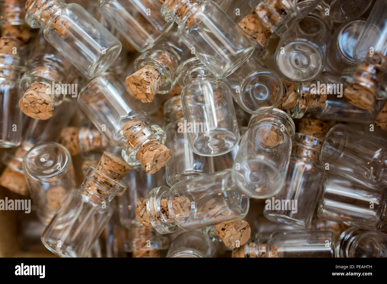 Set of Empty small transparent bottles in a box Stock Photo - Alamy