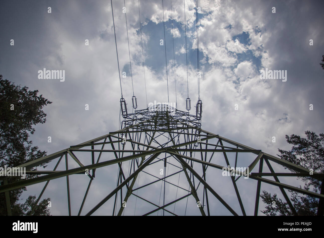 Looking up to sky Electric Pylon Stock Photo - Alamy