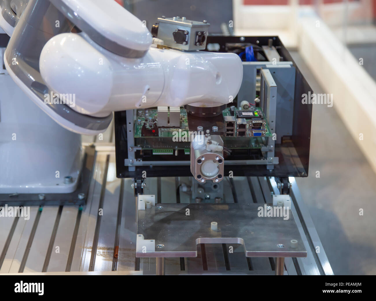 Automated industry robotic arm computer electronic assembly Stock Photo ...