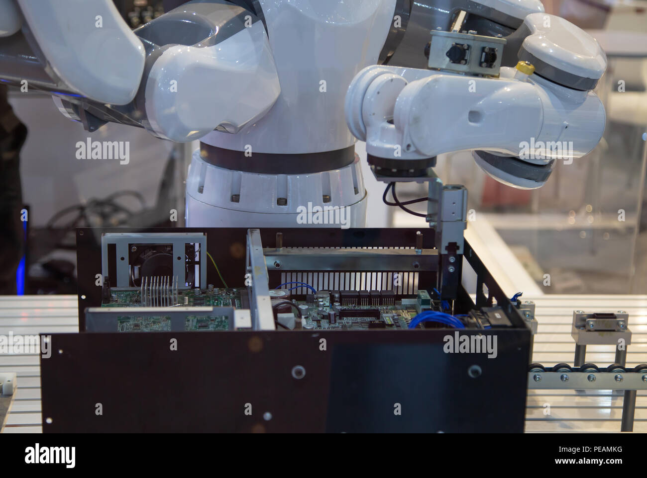 Automated industry robotic arm computer electronic assembly Stock Photo ...