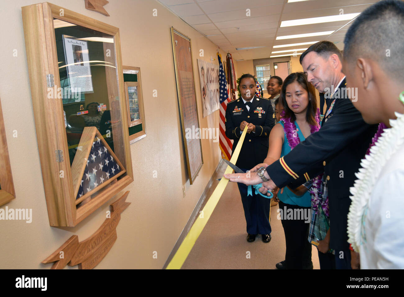 The Agno family and Lt. Col. Patrick A. Disney, commander, 325th ...