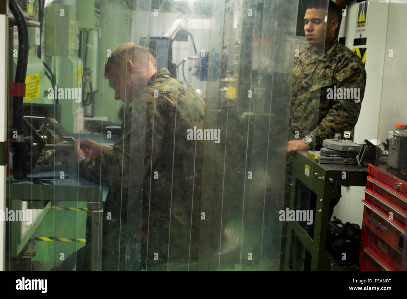 U.S. Marine Corps Sgt. Dylan L. Stowers, left, a reconfigurable ...