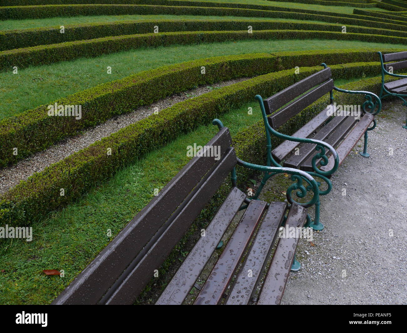 Bench in park during rain hi-res stock photography and images - Alamy