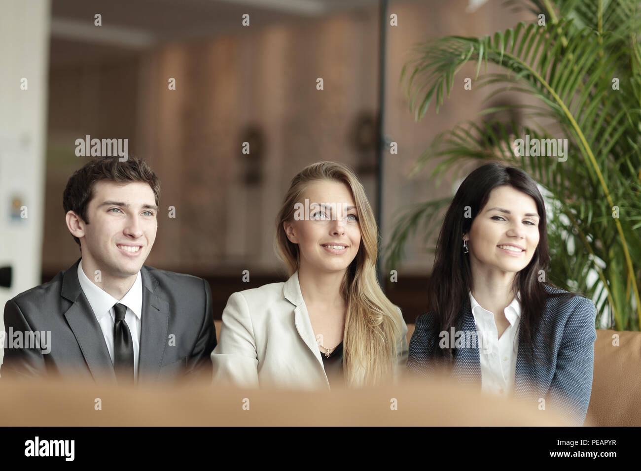 close up. members of successful business team on office background ...