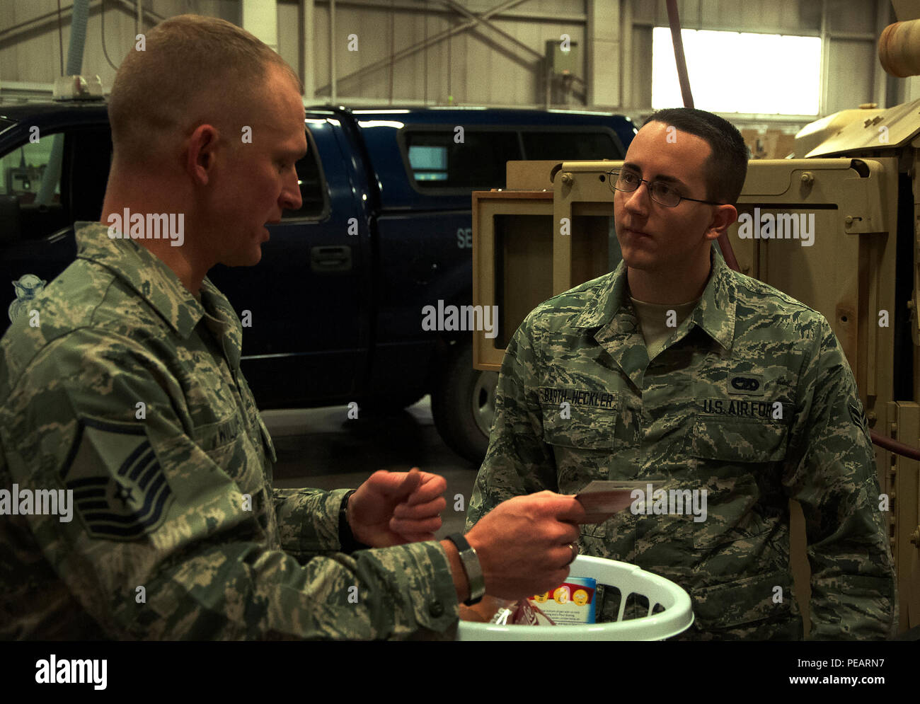 Master Sgt. Brian Williams, 90th Logistics Readiness Squadron, presents ...