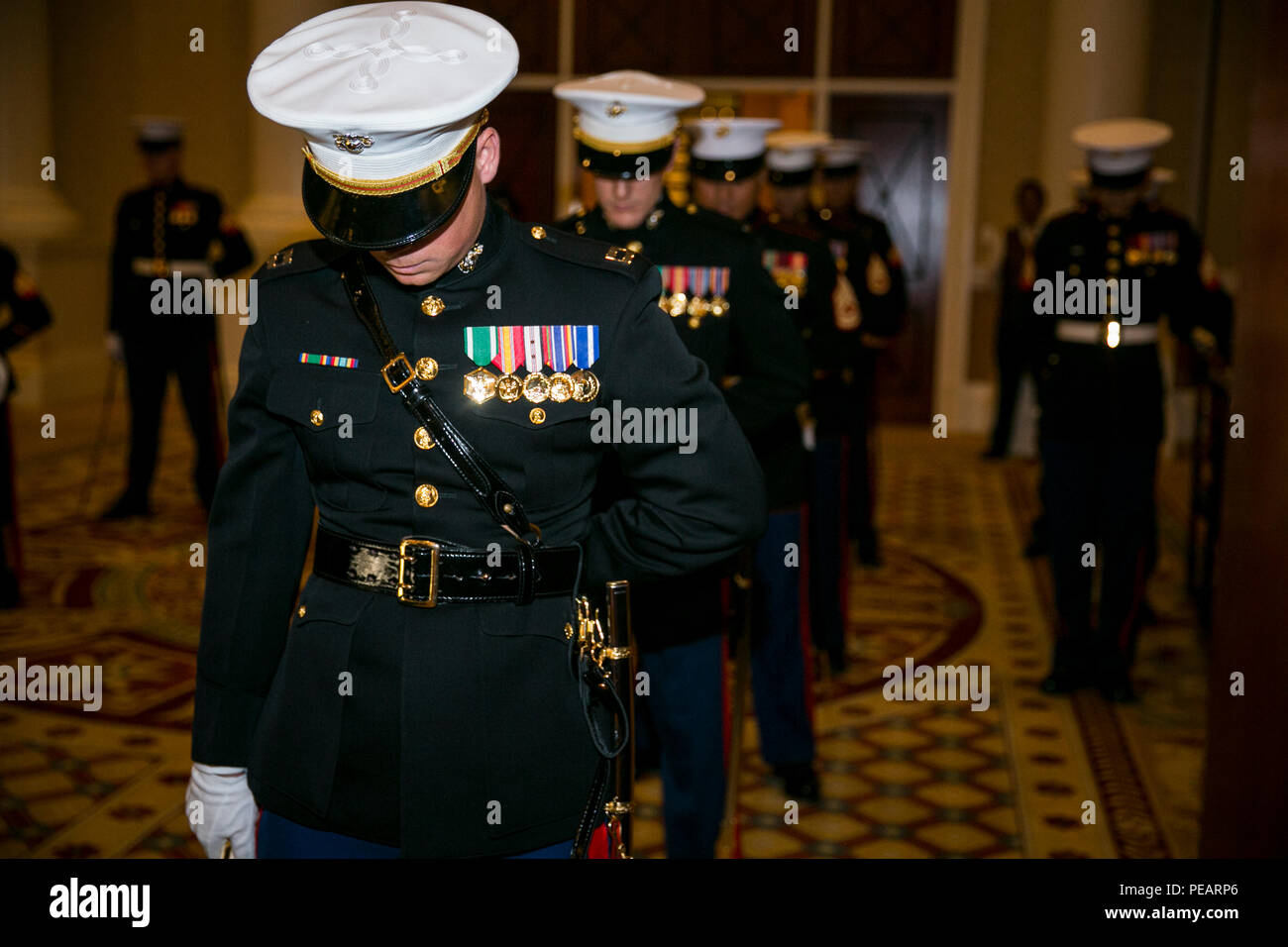 Headquarters Battalion Marines pause for prayer during an invocation ...