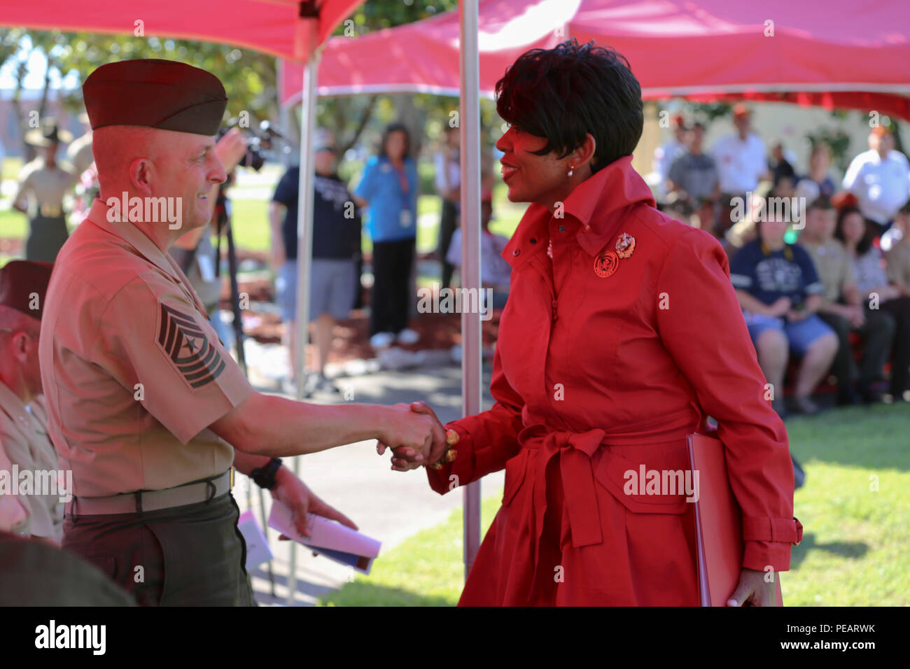 Dr. Betty Moseley Brown, guest speaker, shakes hands with Sgt. Maj ...