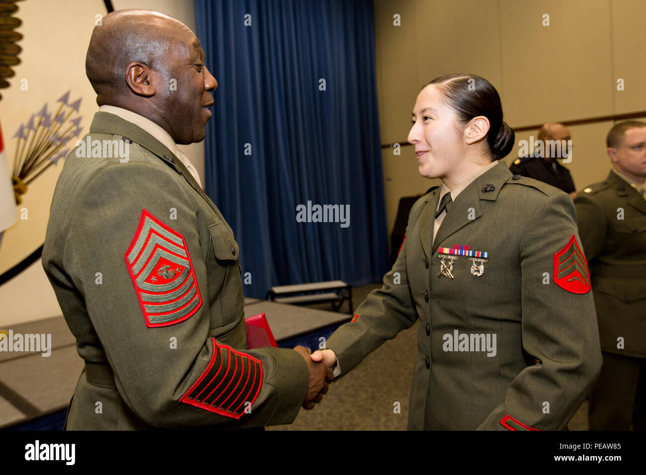 Sgt. Maj. of the Marine Corps Ronald L. Green congratulates Sgt. Miriam ...