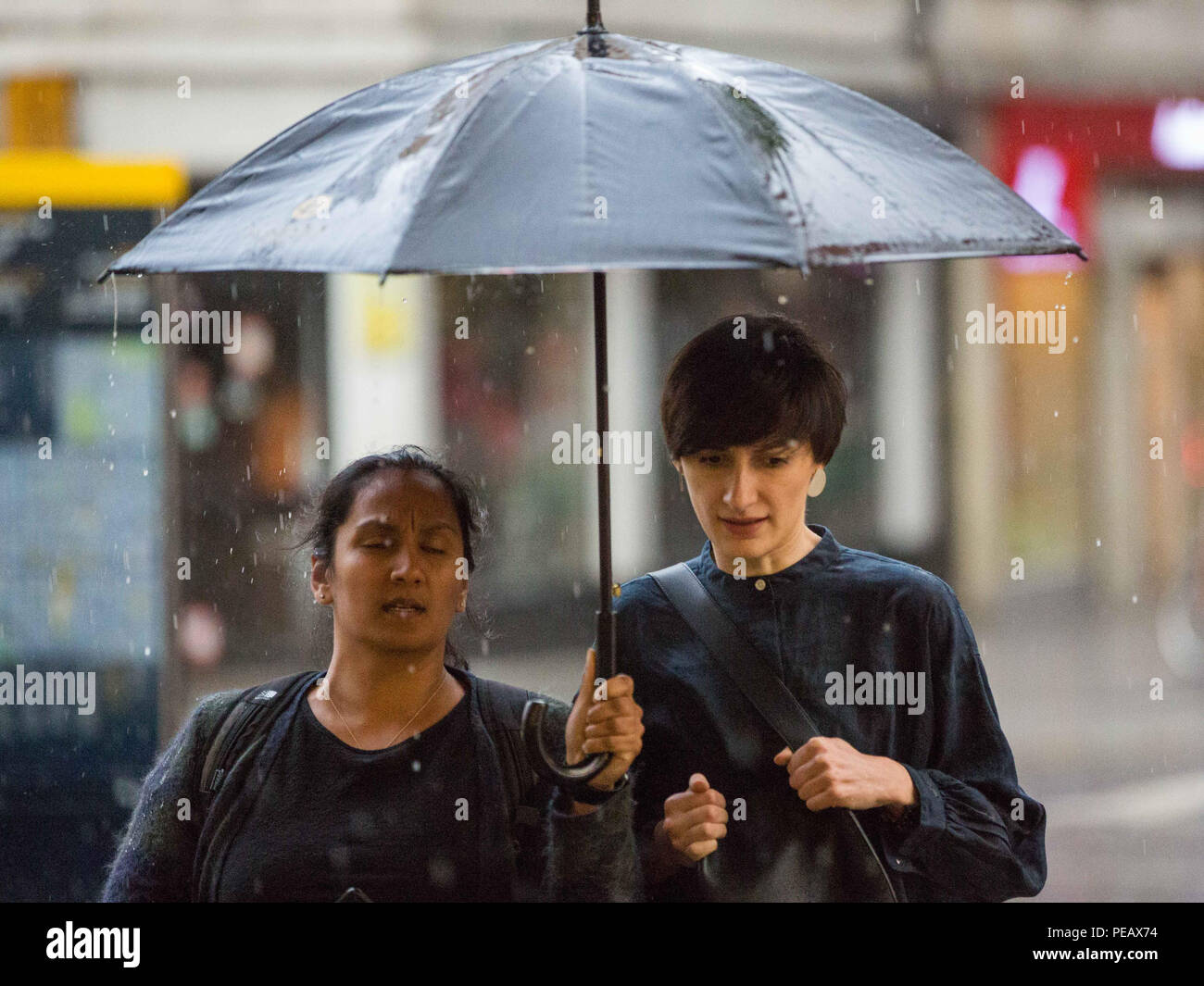 Torrential rainstorm in London catches commuters and tourists by ...