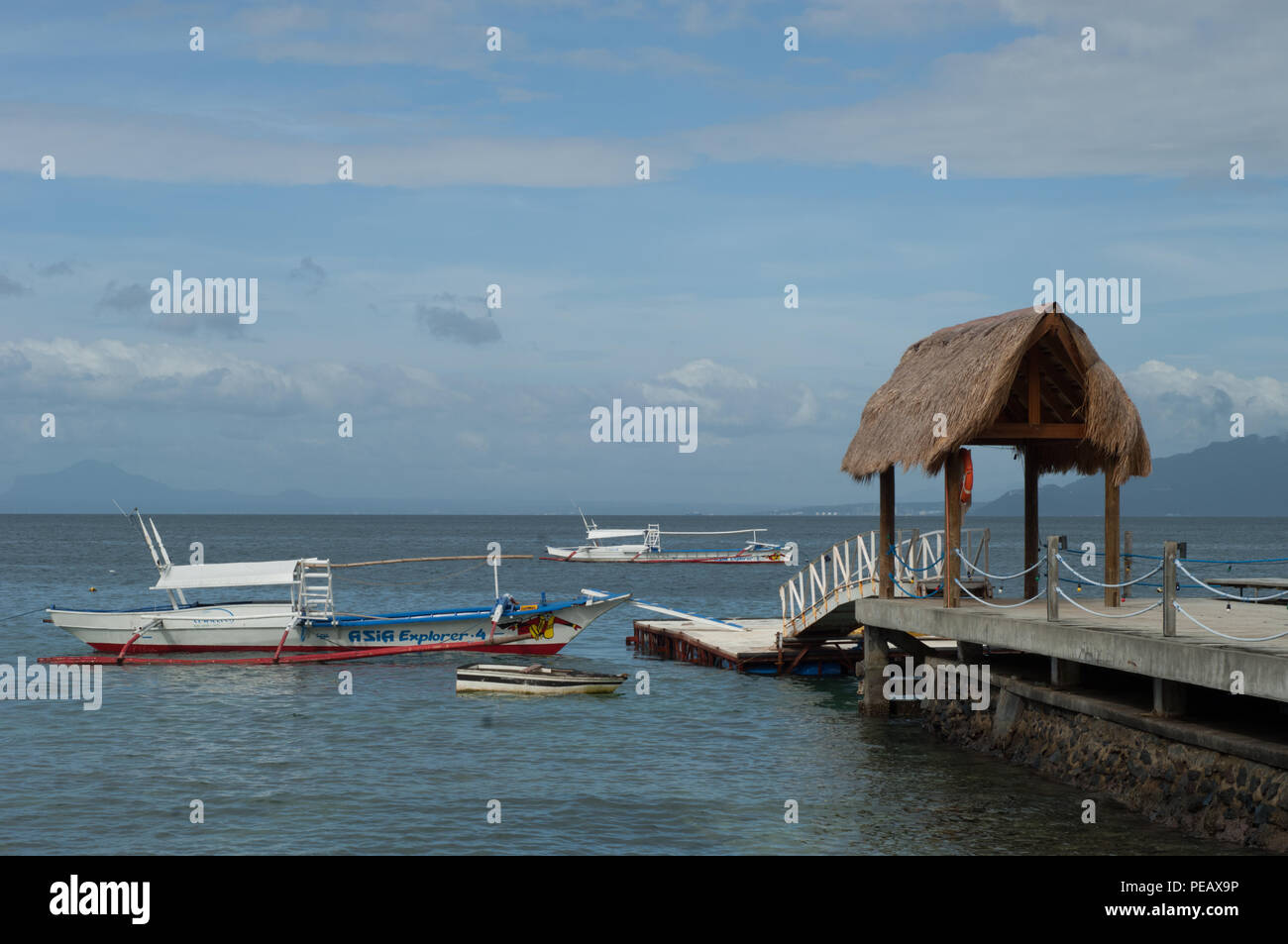 The jetty, White Beach, Mindoro, Philippines Stock Photo - Alamy