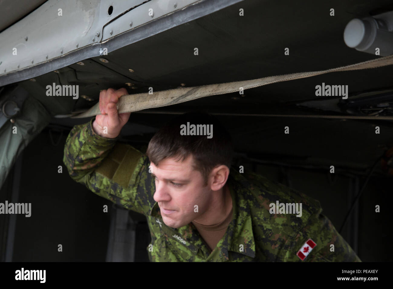 A Canadian paratrooper participates in jumpmaster aircraft ...