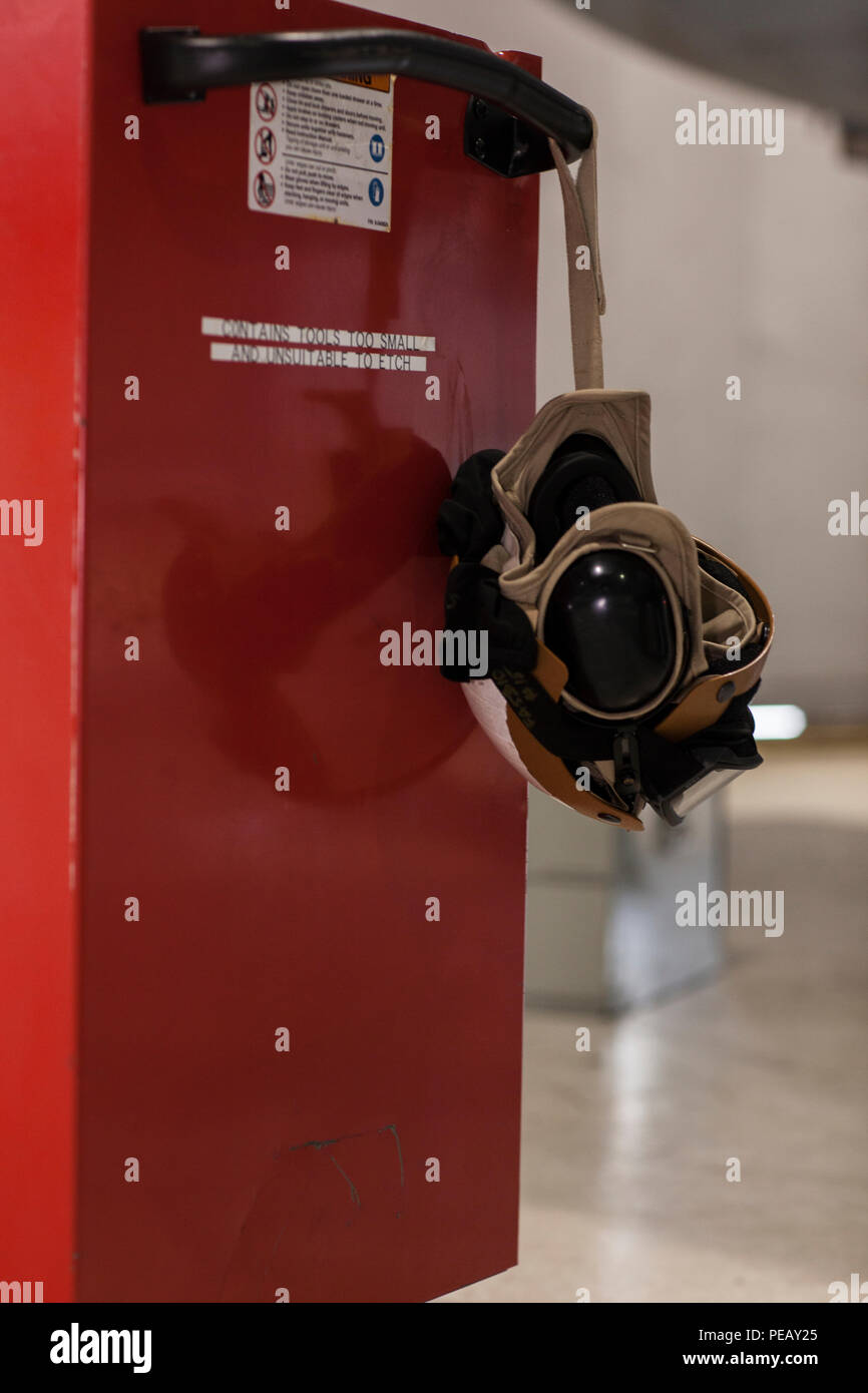 A cranial hangs on a toolbox in Marine Tactical Electronic Warfare ...