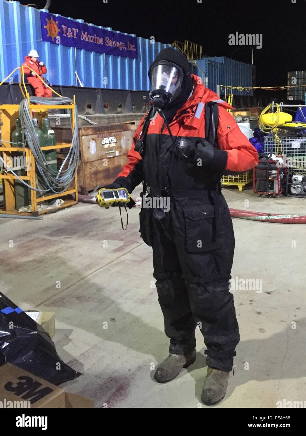 A responder conducts air monitoring throughout lightering operations ...