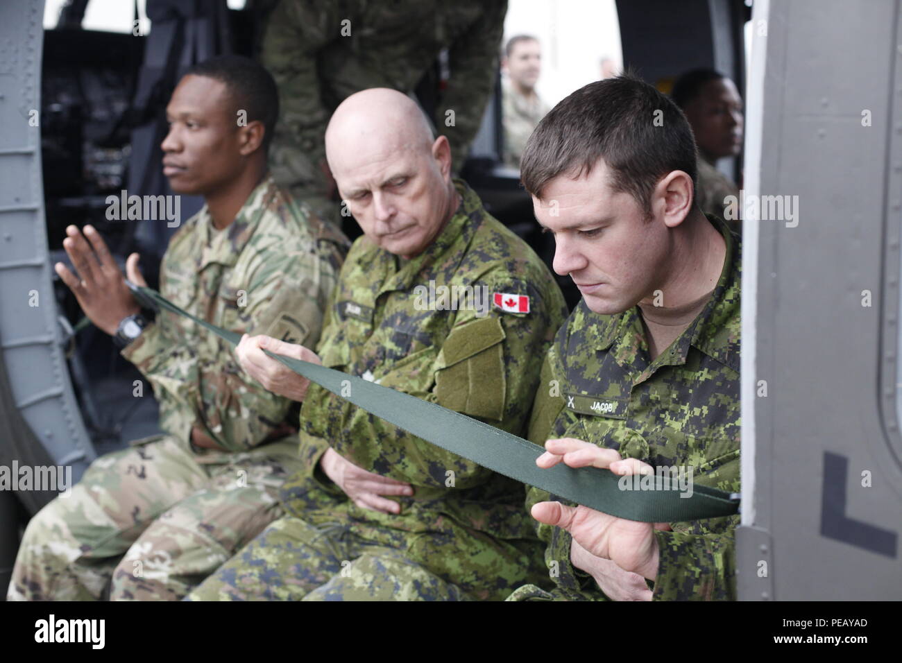 Canadian Armed Forces Sgt. Joe Hillier and Sgt. Zach Jacob conduct ...