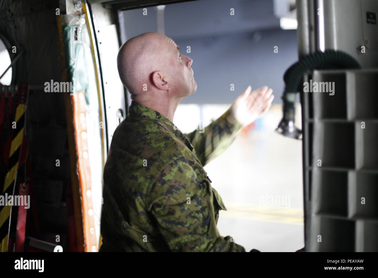 Canadian Armed Forces Sgt. Joe Hillier conducts jumpmaster rehearsals ...