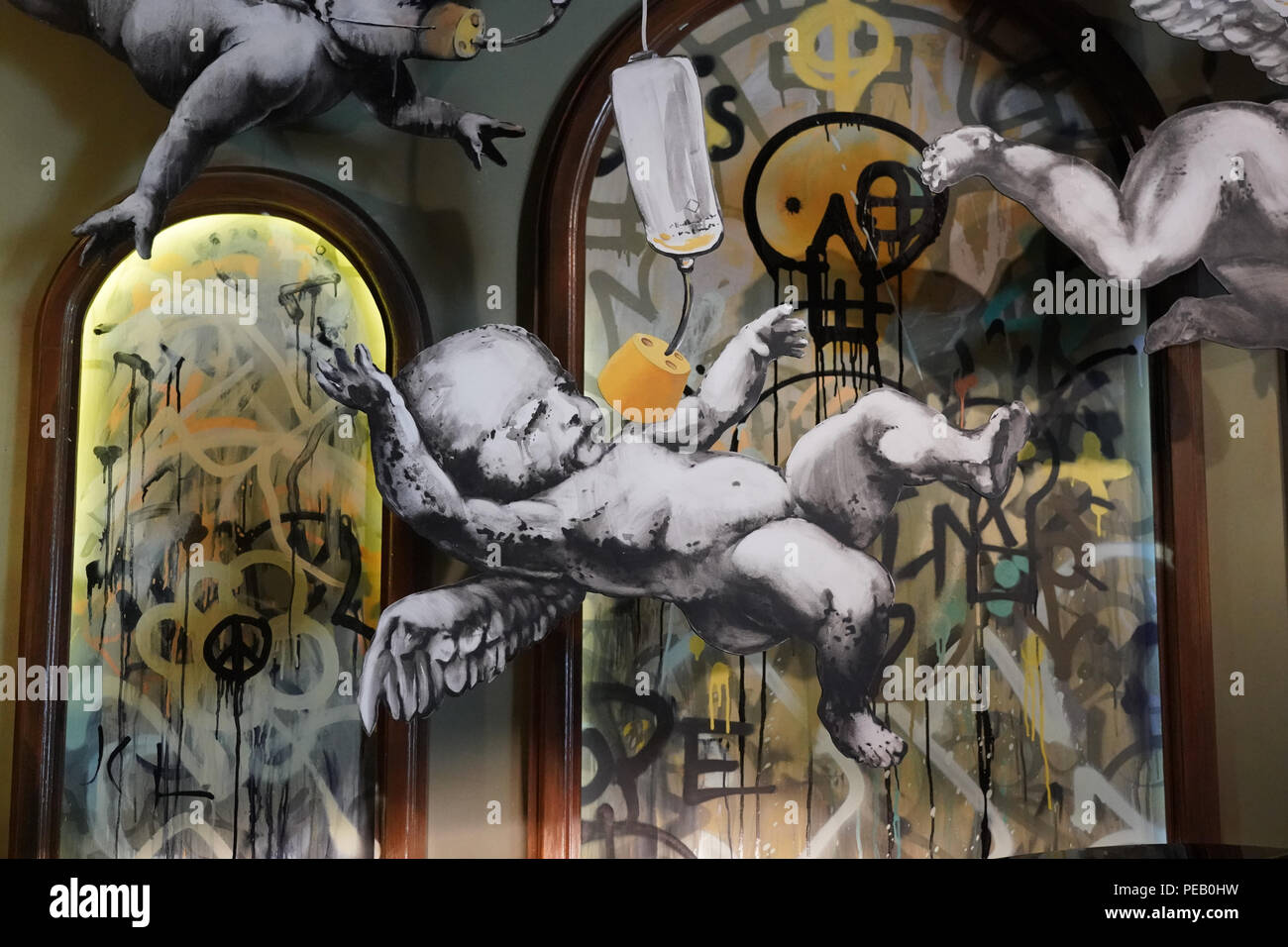 Wall decoration in the Walled Off Hotel (owned by Bansky) near the wall ...