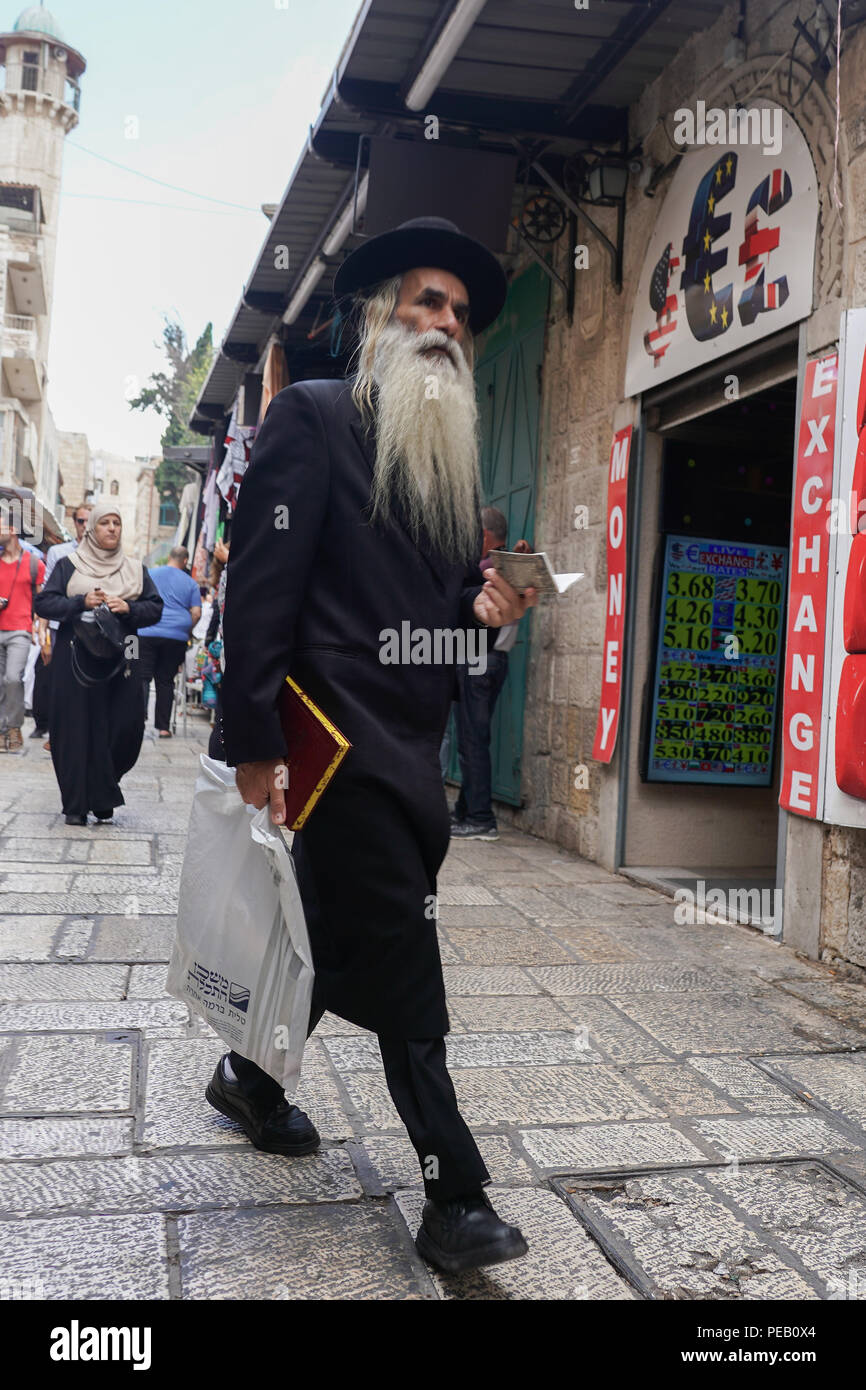 A traditionally dressed orthodox Jewish man in the Old City of ...