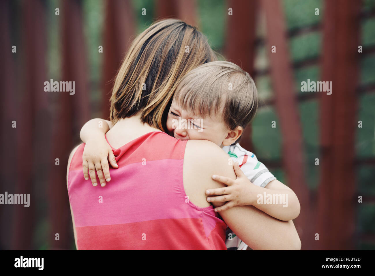 Mother Comforting Crying Child High Resolution Stock Photography and ...