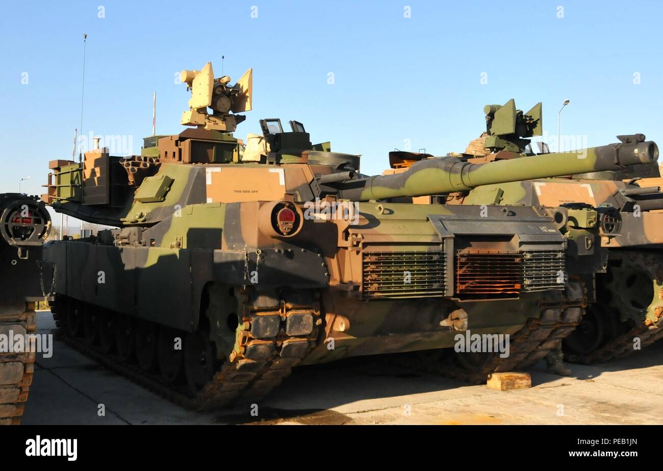 A M1A2 Abrams tank sits in a motorpool at Mihail Kogălniceanu Air Base ...