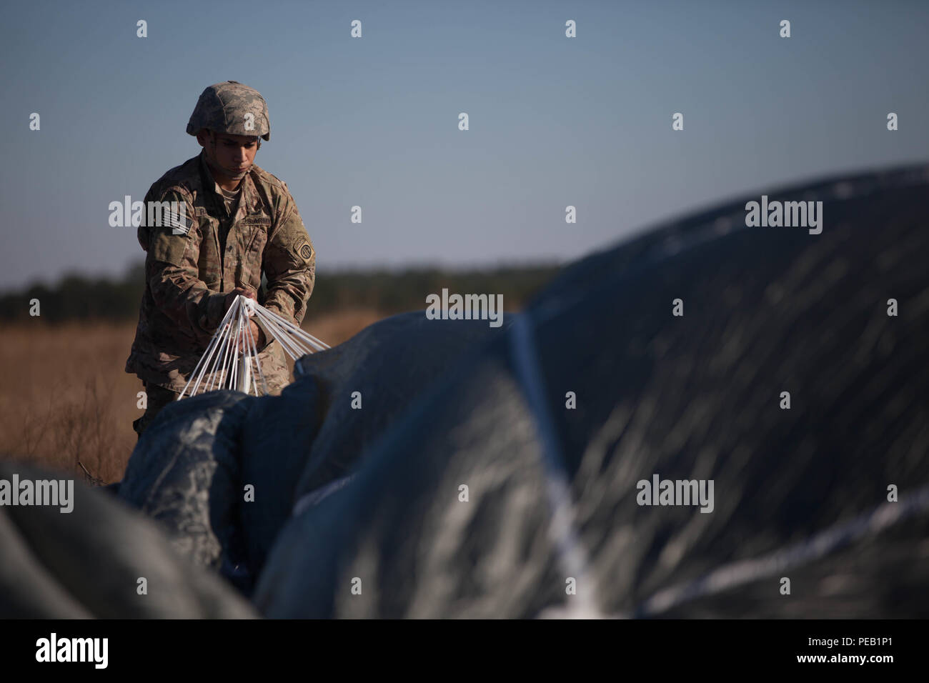 A U.S. Army paratrooper, assigned to the 82nd Airbone Division ...
