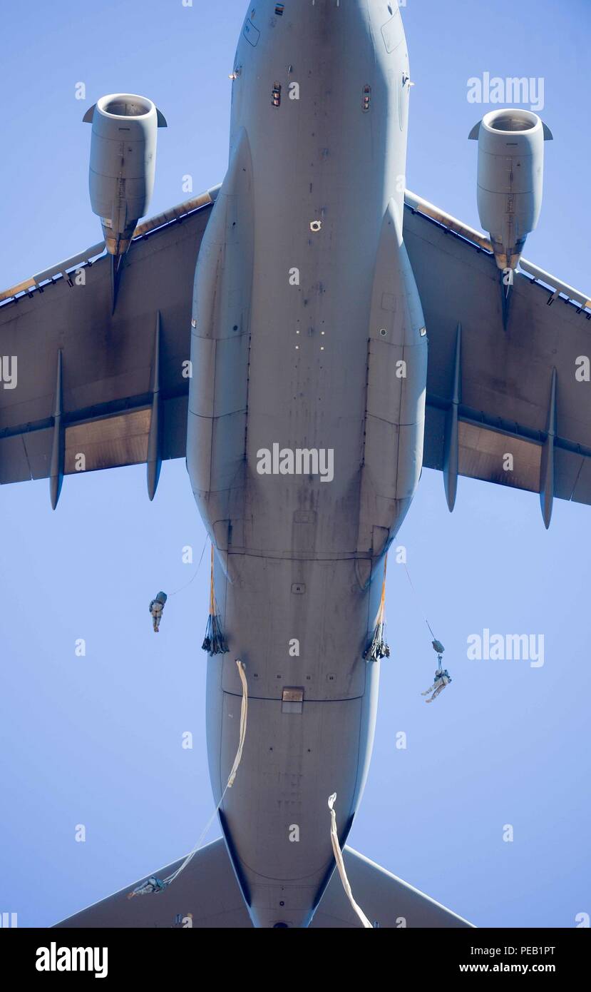 U.S. Army paratroopers assigned to the 82nd Airborne Division drop from ...