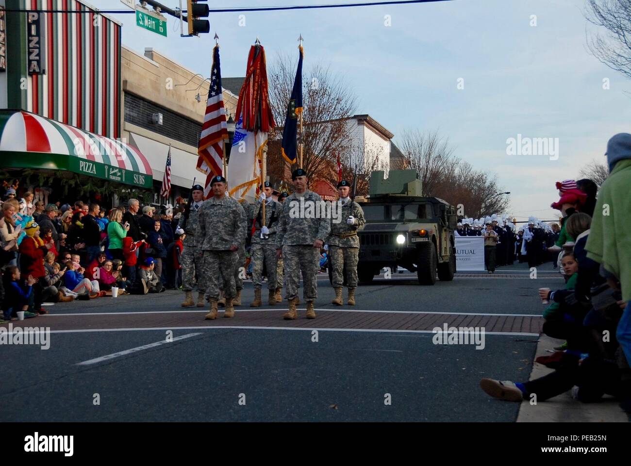 Members of the 20th CBRNE Command march with a color guard during a ...
