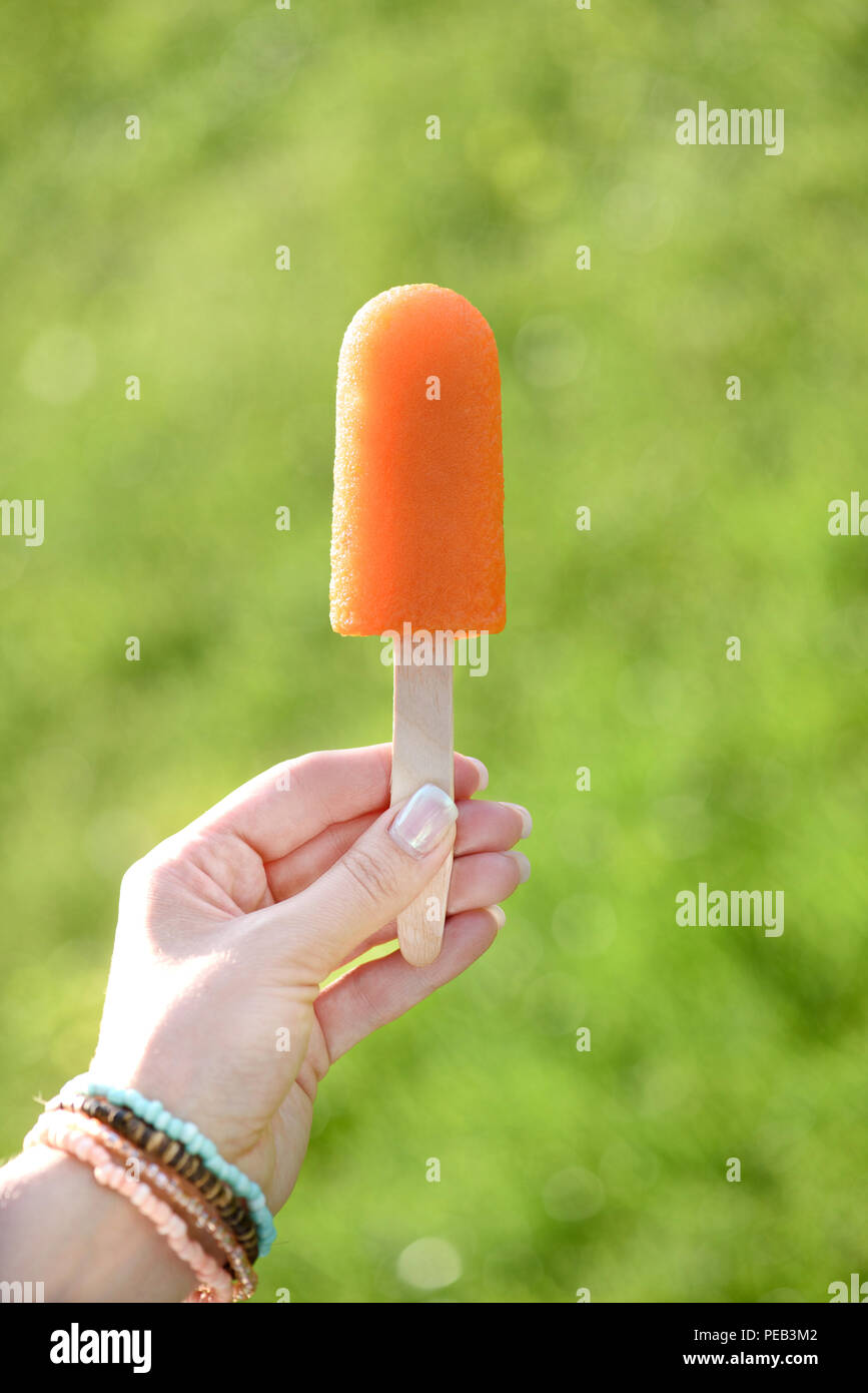 Person outdoors popsicle hi-res stock photography and images - Alamy
