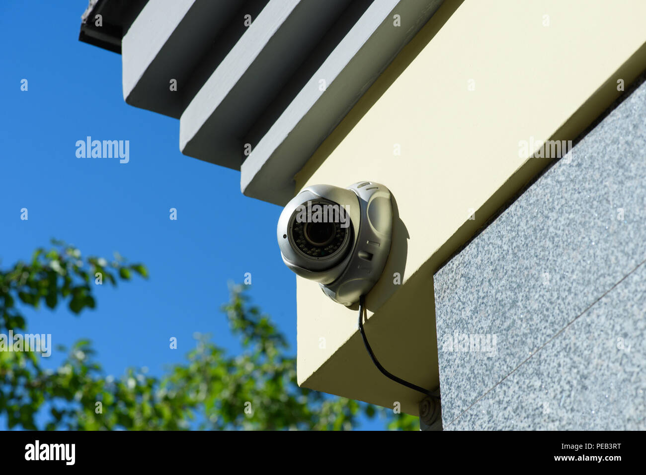 close up view of security camera on building facade in sunlight Stock ...