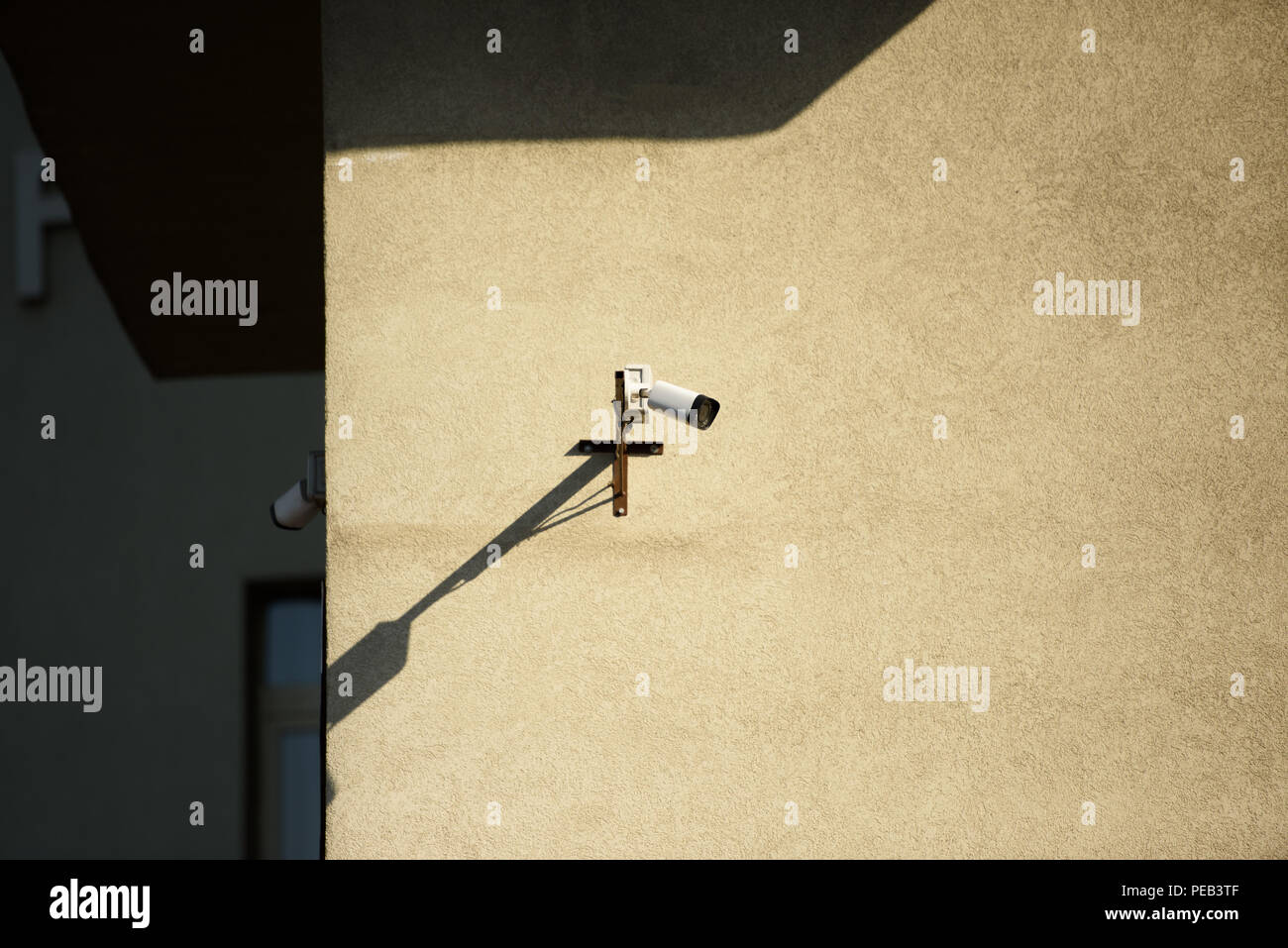 close up view of security camera on building facade in sunlight Stock ...
