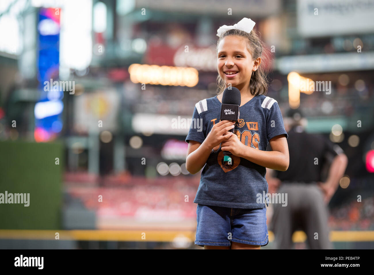 August 12, 2018: A young fan announces the start of play during the ...