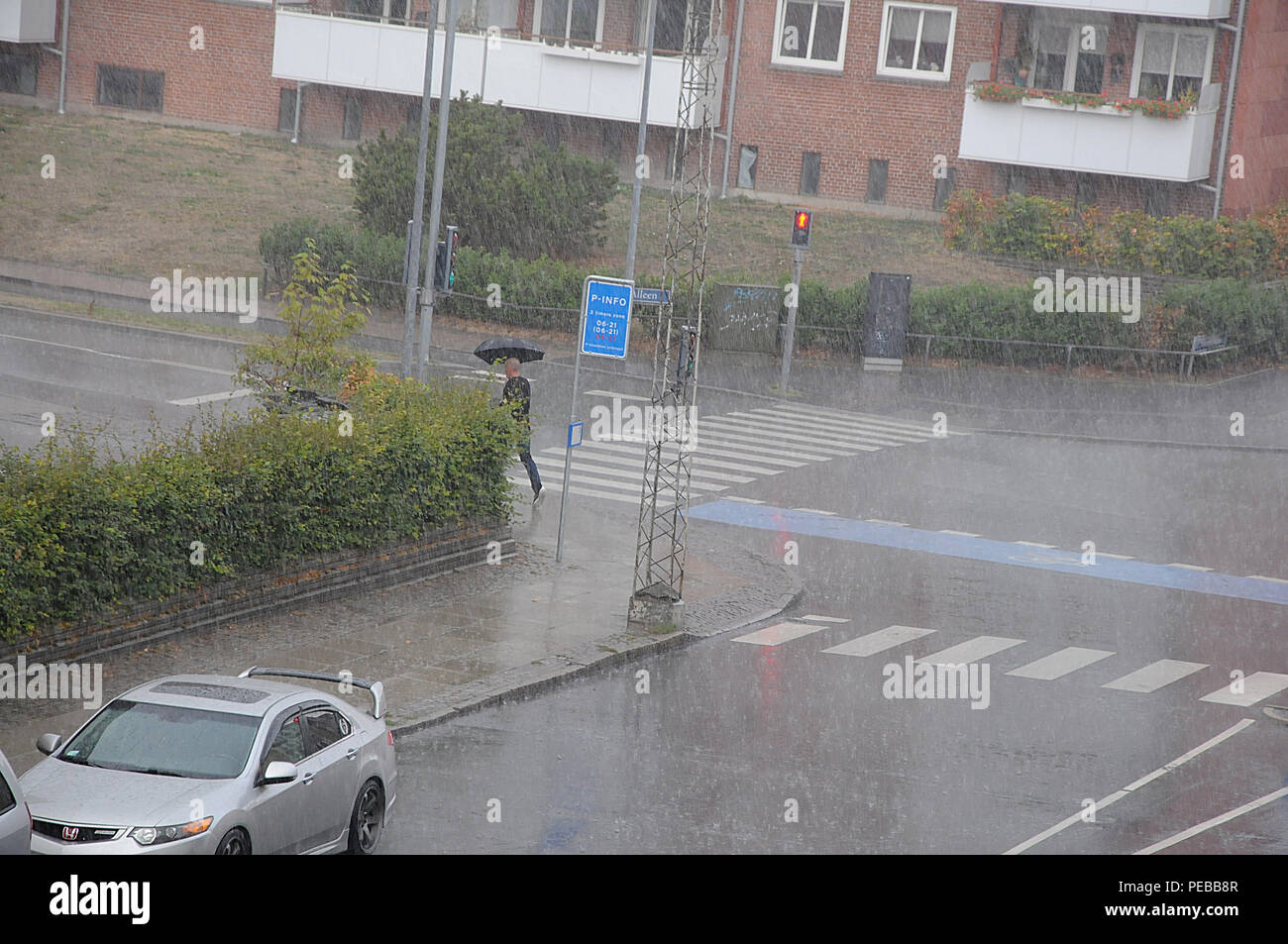 Copenhagen, Denmark. 14th Aug 2018. Heavy rain in Danish capital ...