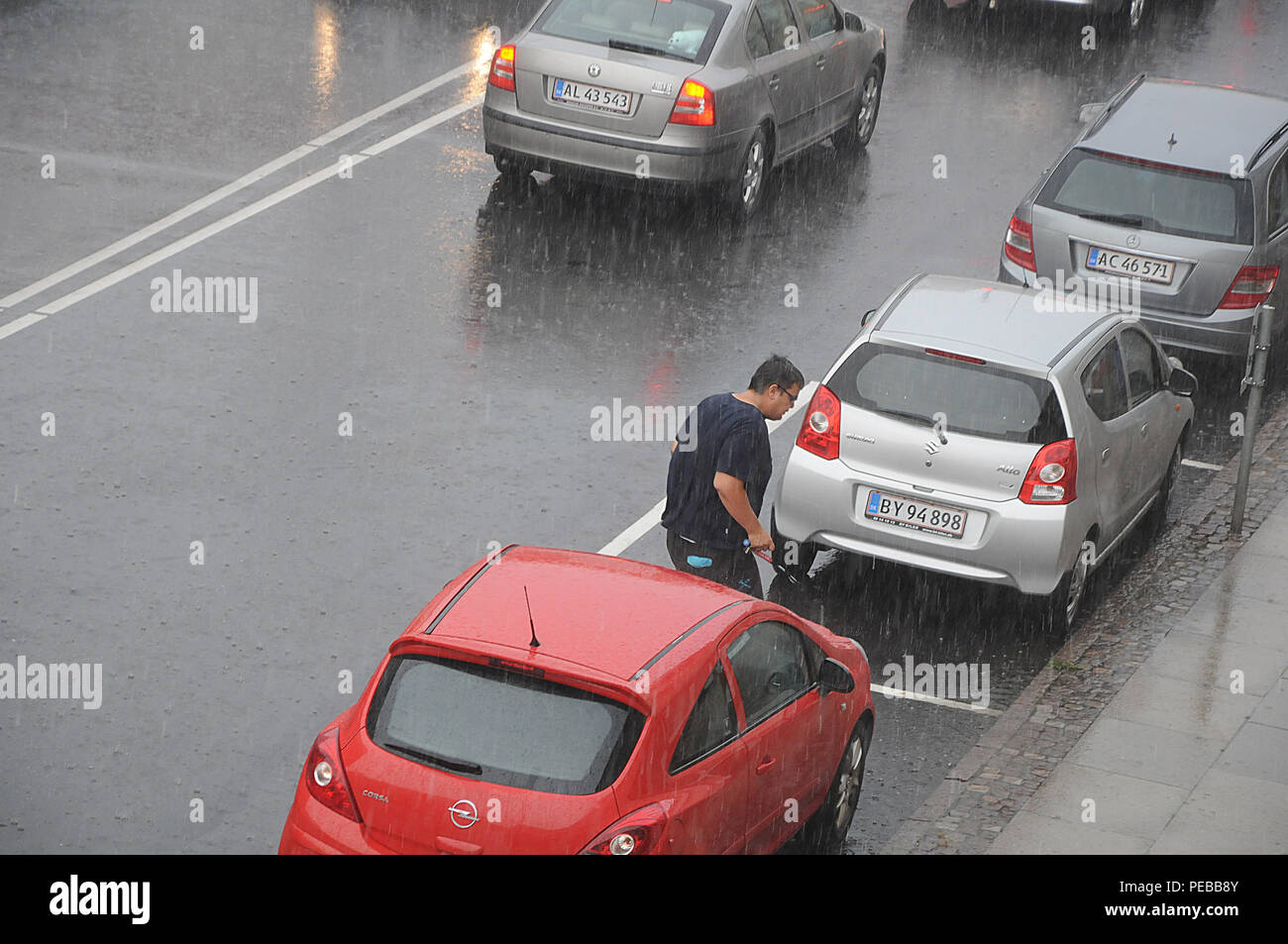 Copenhagen, Denmark. 14th Aug 2018. Heavy rain in Danish capital ...