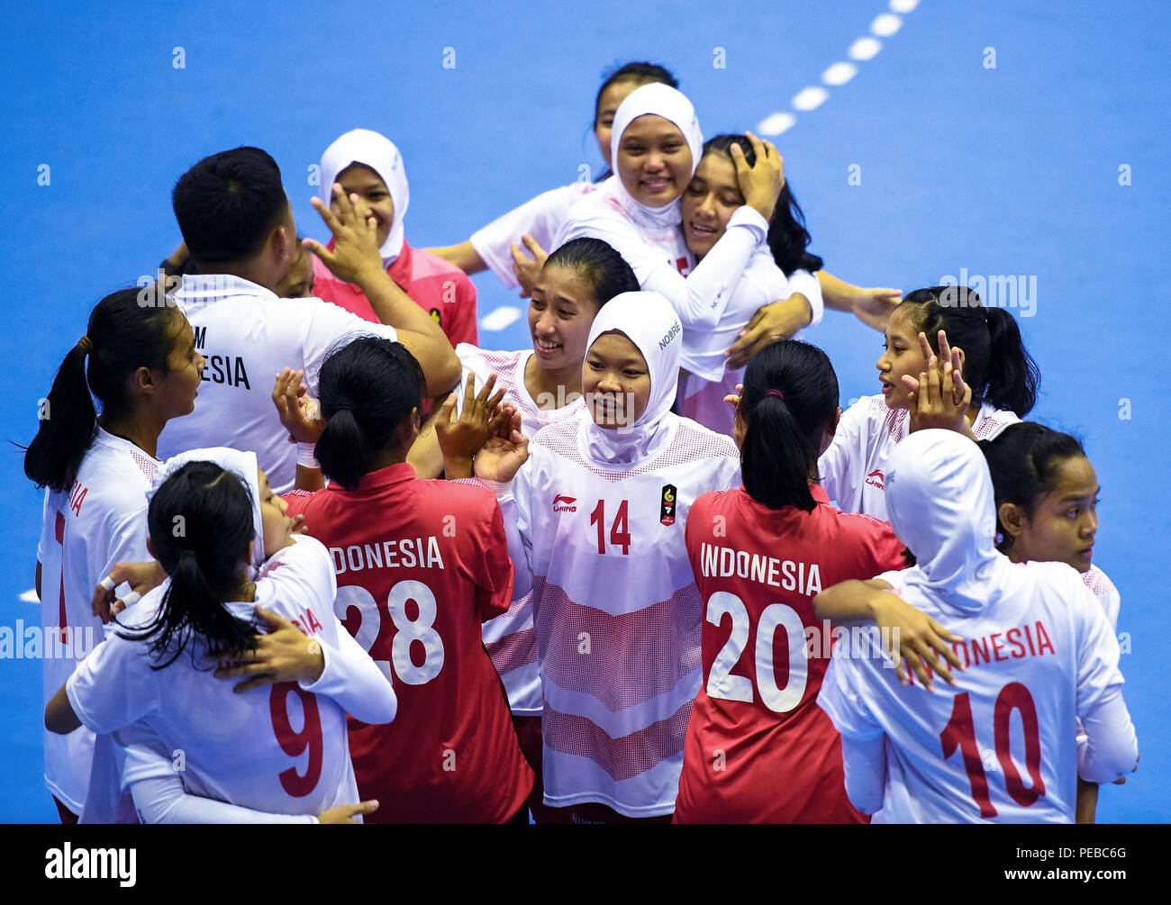 Jakarta. 14th Aug, 2018. Indonesian players celebrate after the women's ...