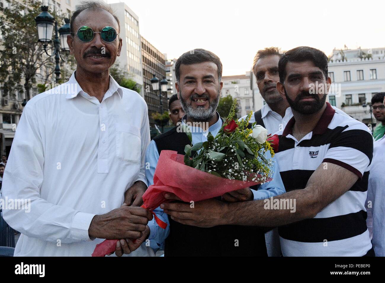 Athens, Greece. 14th Aug, 2018. Members of the Pakistani community seen ...