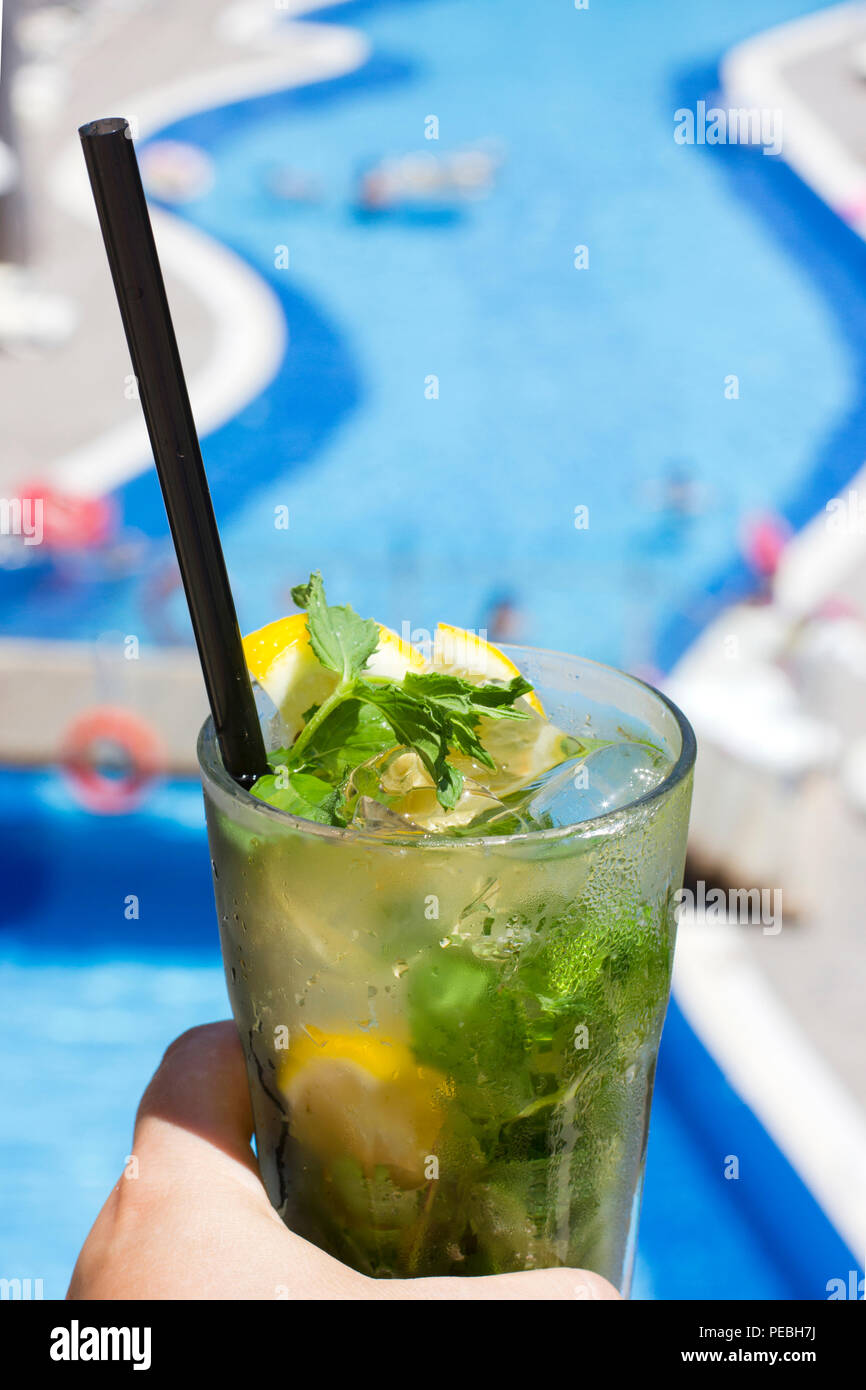 Hand holding refreshing mojito hi-res stock photography and images - Alamy