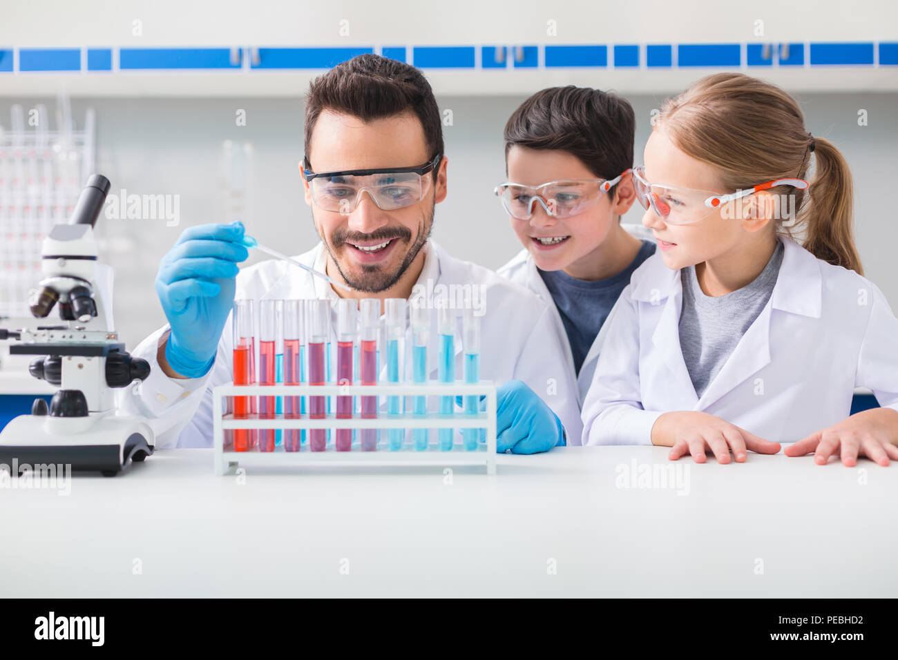 Scientific discovery. Nice positive smart man wearing protective ...