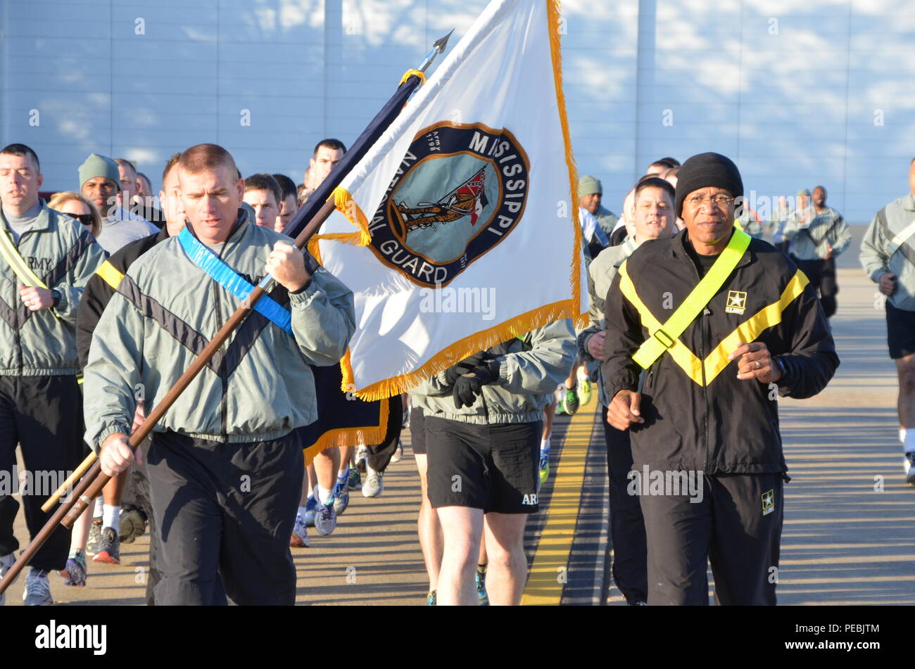Mississippi Army National Guardsmen, Master Sgt. James Aultman carries ...