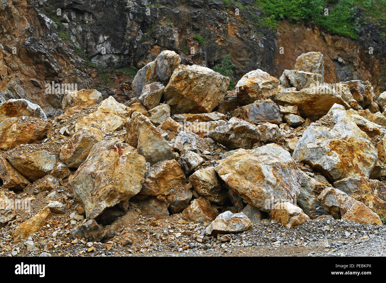 Big stones in open pin quarry Stock Photo - Alamy
