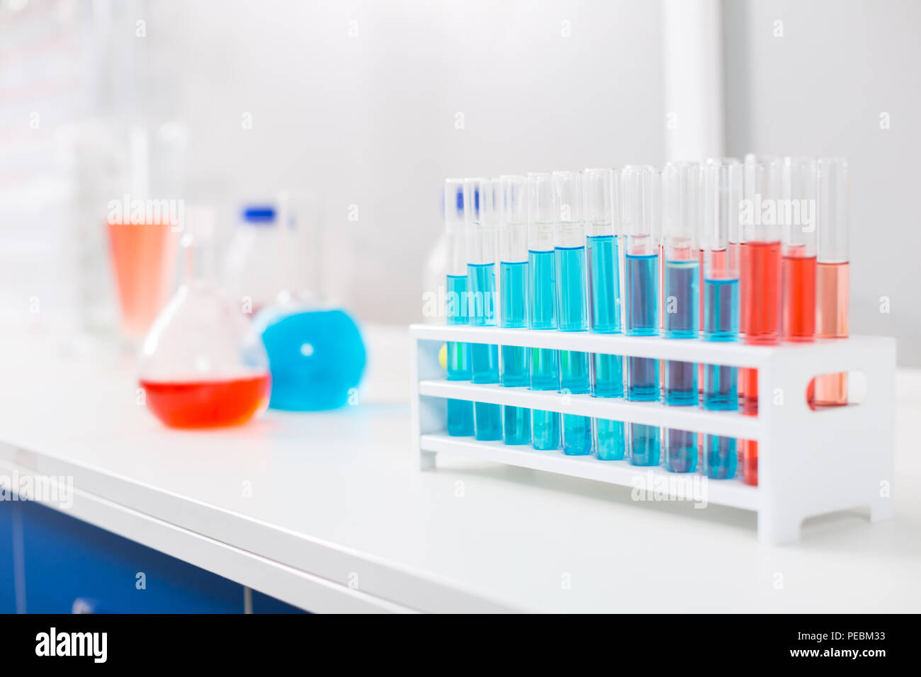 Perfect order. Clear clean vials where red and blue liquids poured and ...