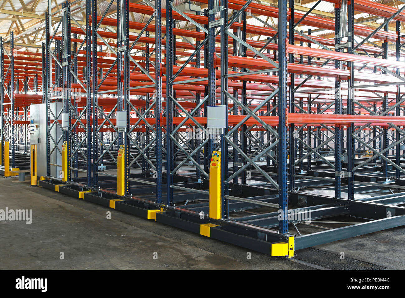 Powered mobile shelving system in archive storage Stock Photo - Alamy