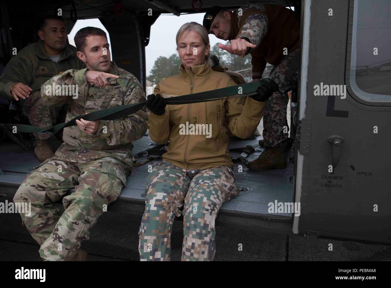 U.S. Army and partner nation jumpmasters demonstrate steps to conduct a ...