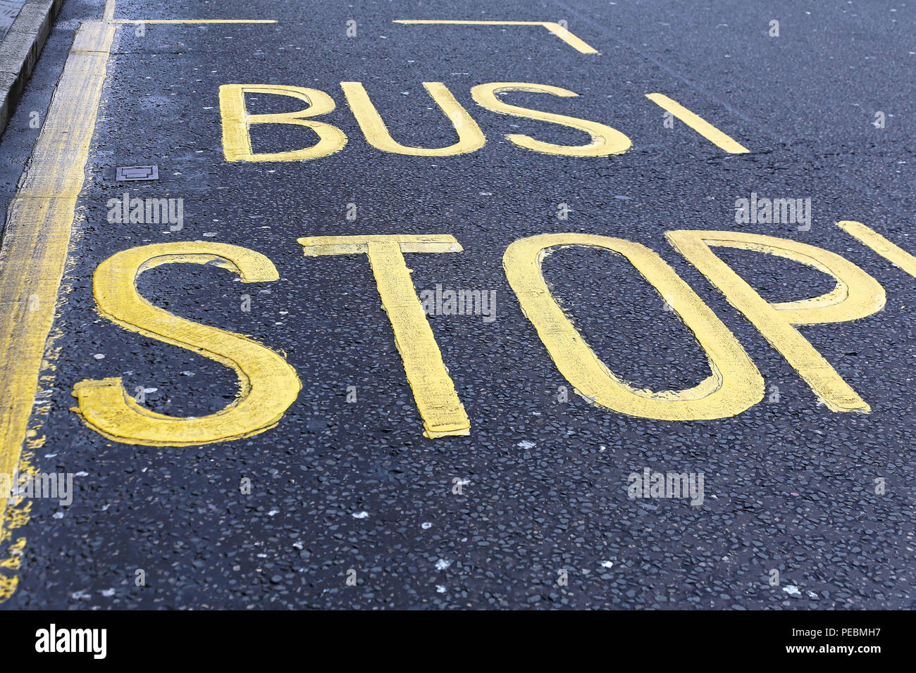 Reserved space for bus stop only Stock Photo - Alamy