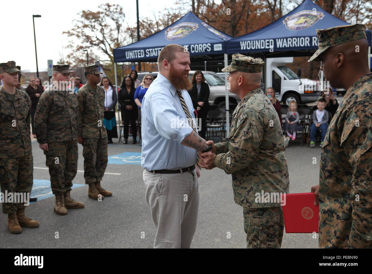 US Marine Corps Col. Willard Buhl congratulates retired Marine Corps ...