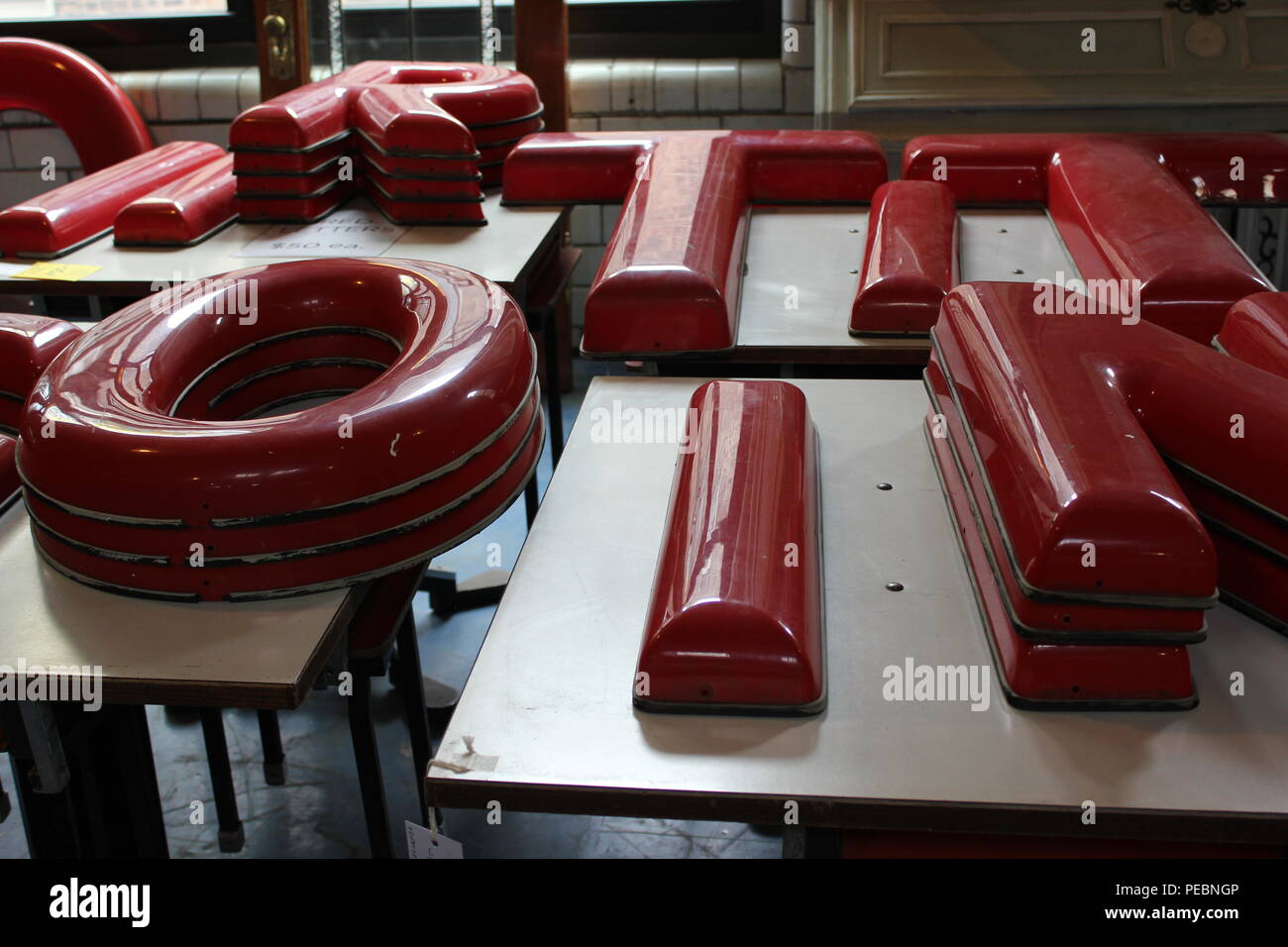 Huge red letter text on a table at Architectural Artifacts in Chicago ...