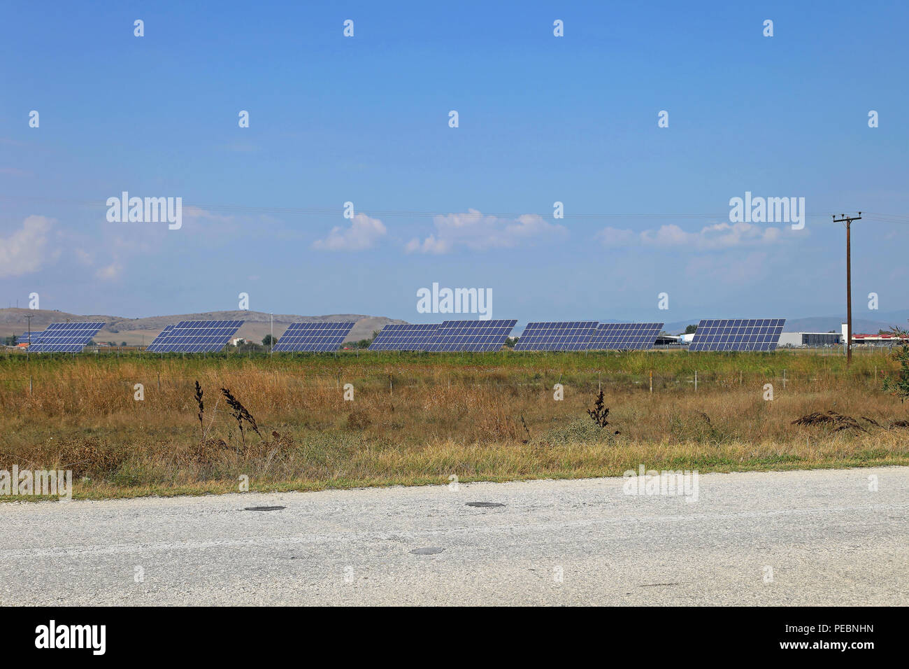 Solar power plant system in field Stock Photo - Alamy