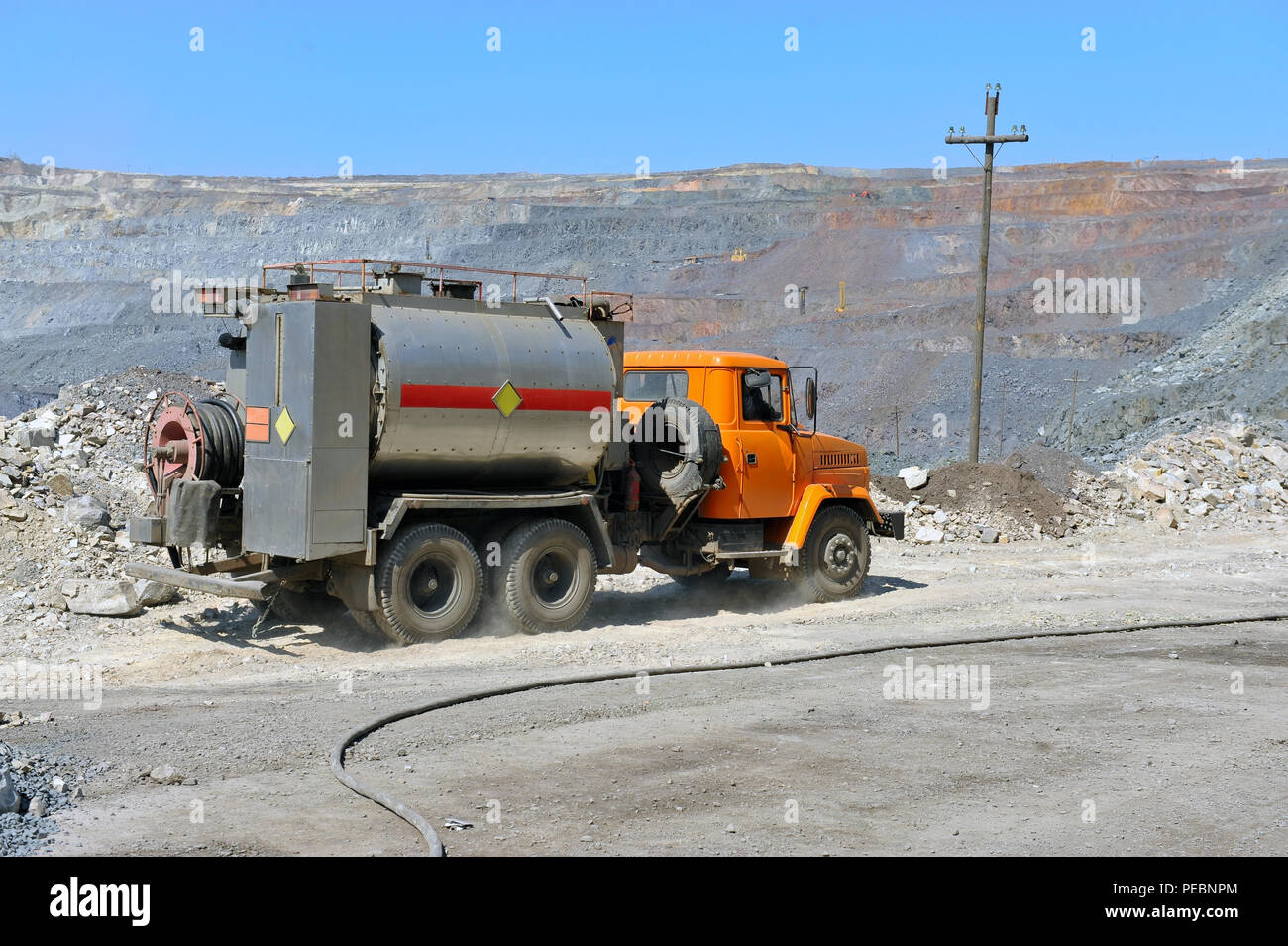 Machine for charging holes with explosives Stock Photo - Alamy