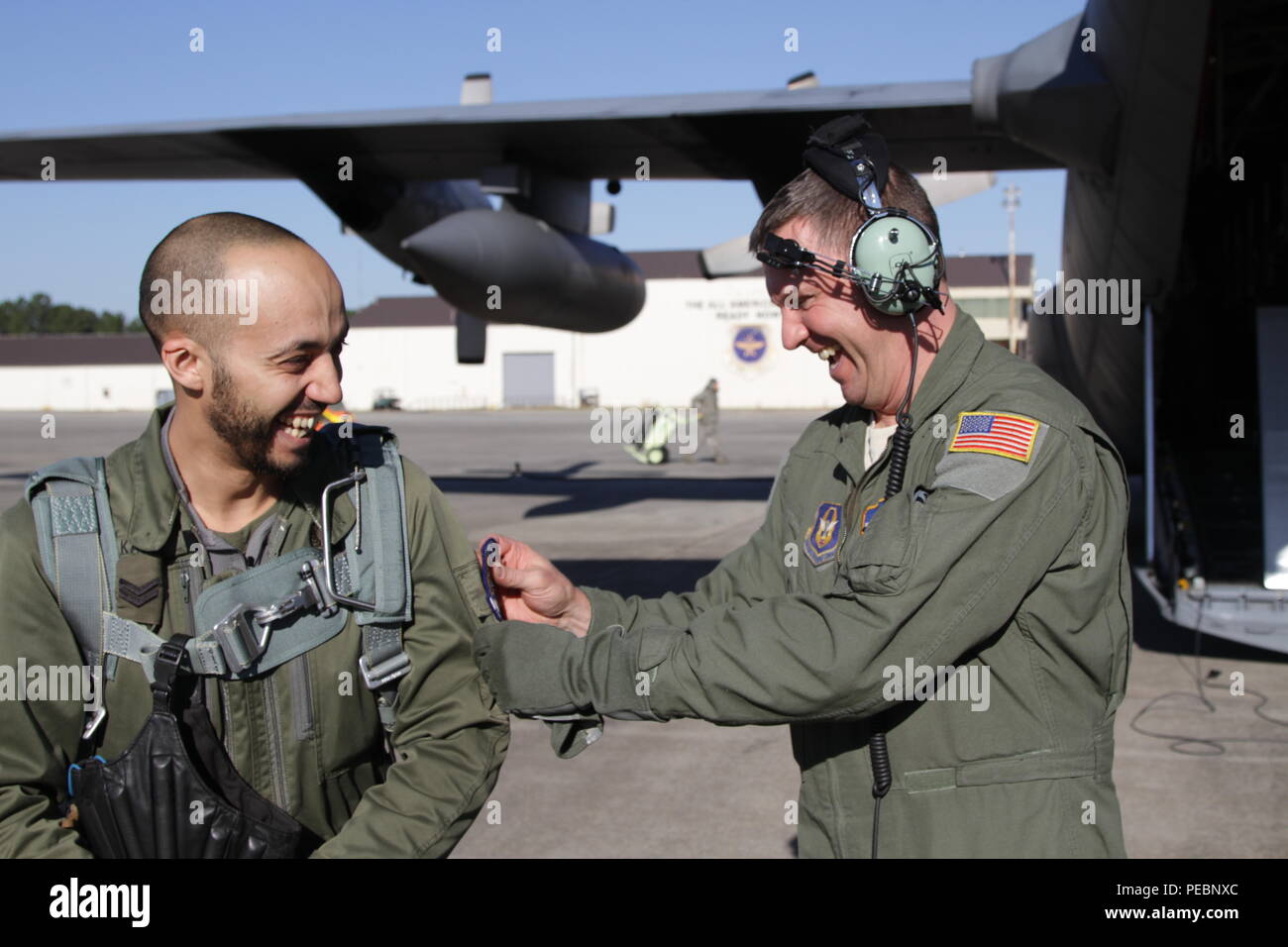 Dutch Jumpmaster Marine Cpl. Ab Kasmi participates in a patch exchange ...