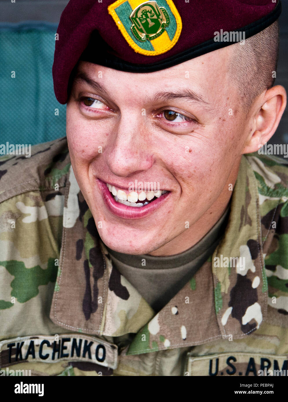 U.S. Army Staff Sgt. Micheal Tkachenko waits in line to donate his toy ...